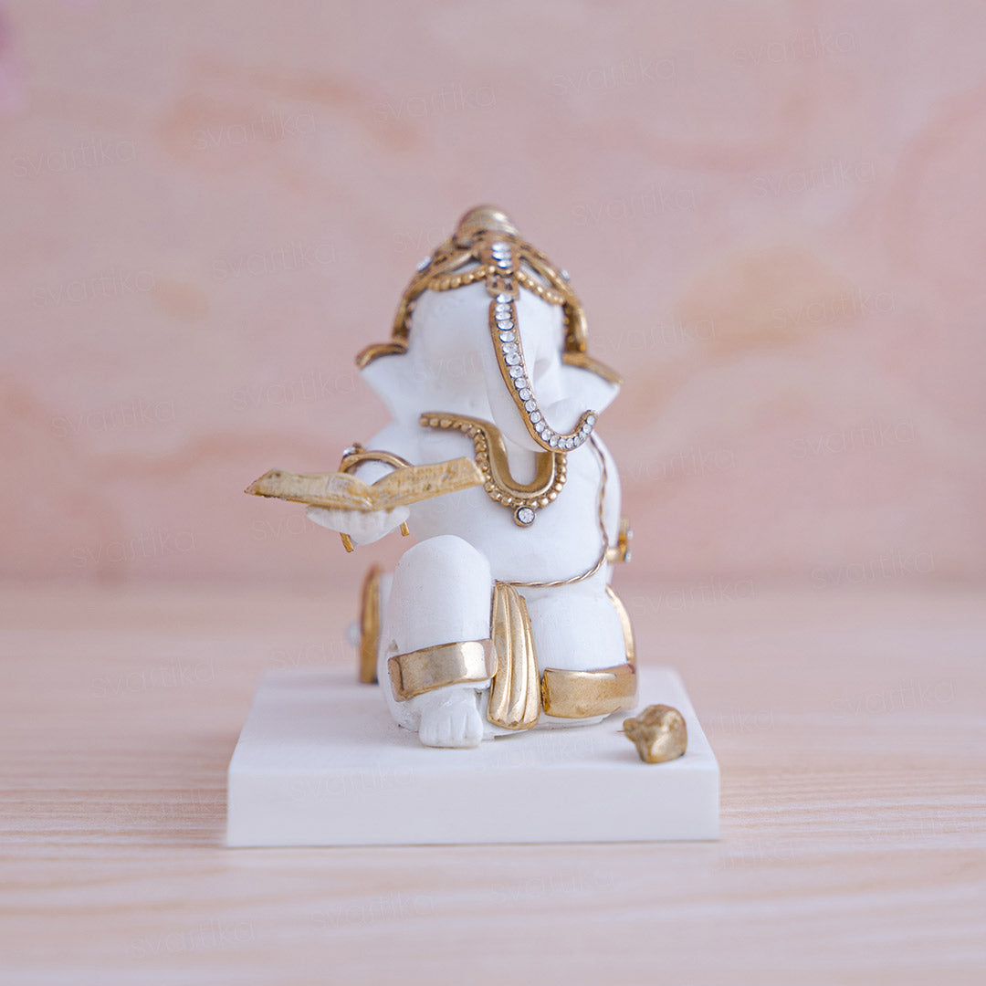 Premium White & Gold Ganesha Reading Idol (3 Inch)